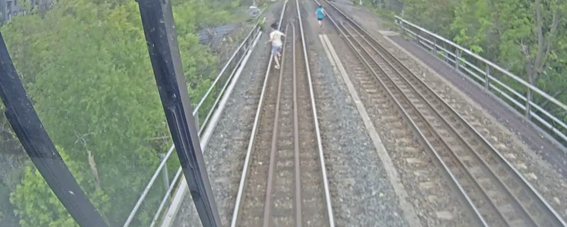 GO Train narrowly misses kids playing on tracks