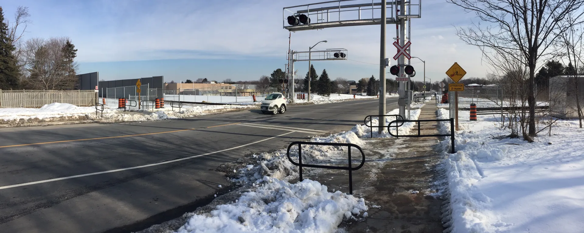 Pedestrian crossing arms in full swing at Stouffville crossings